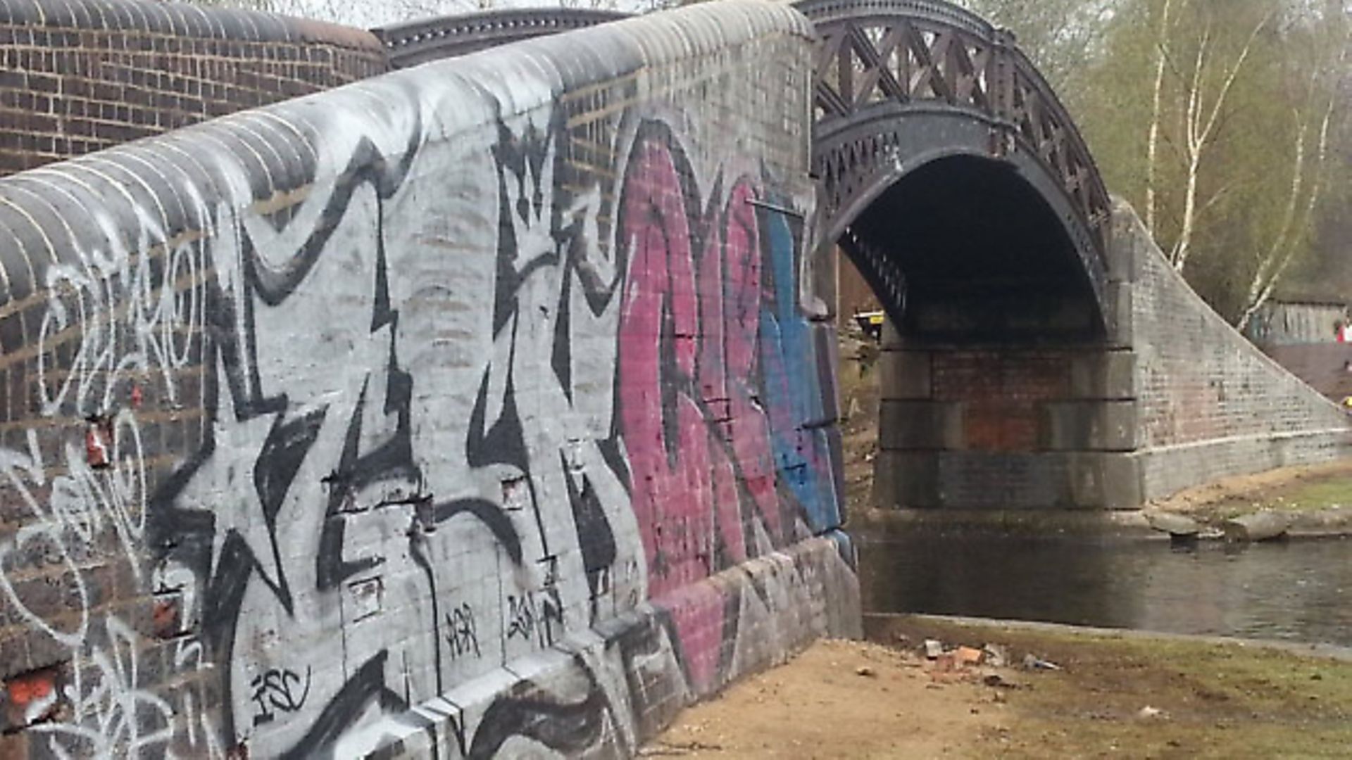 Birmingham historic bridge defaced - Canal Boat